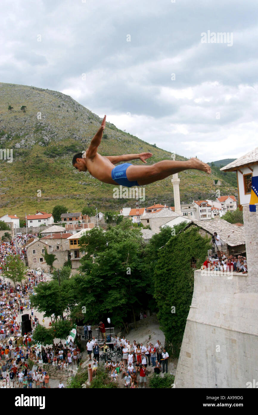 Traditional cliff diving jumps in Mostar Stock Photo - Alamy