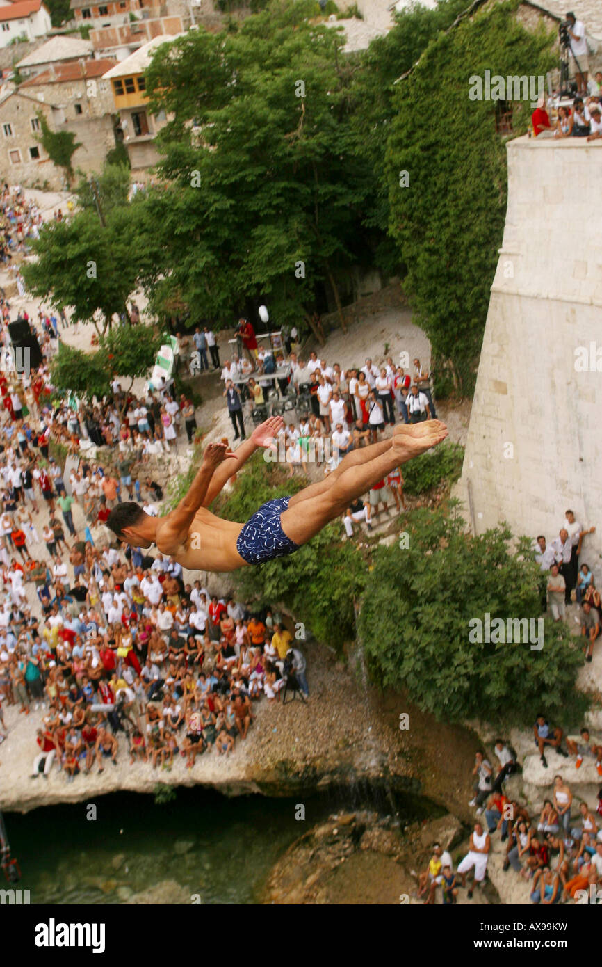 Traditional cliff diving jumps in Mostar Stock Photo - Alamy