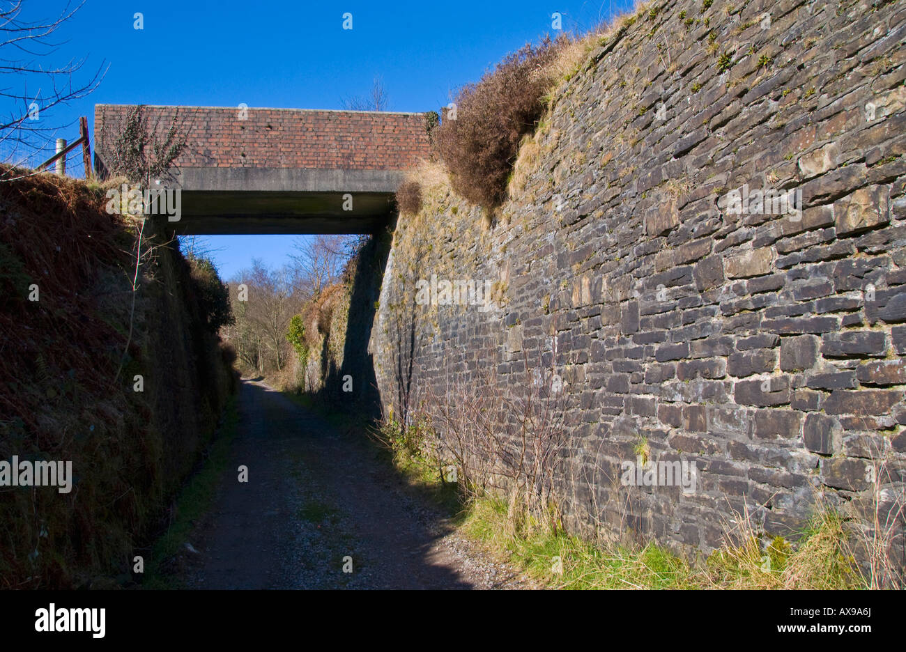 Former rail track from Blaenserchan Colliery with bridge over near ...