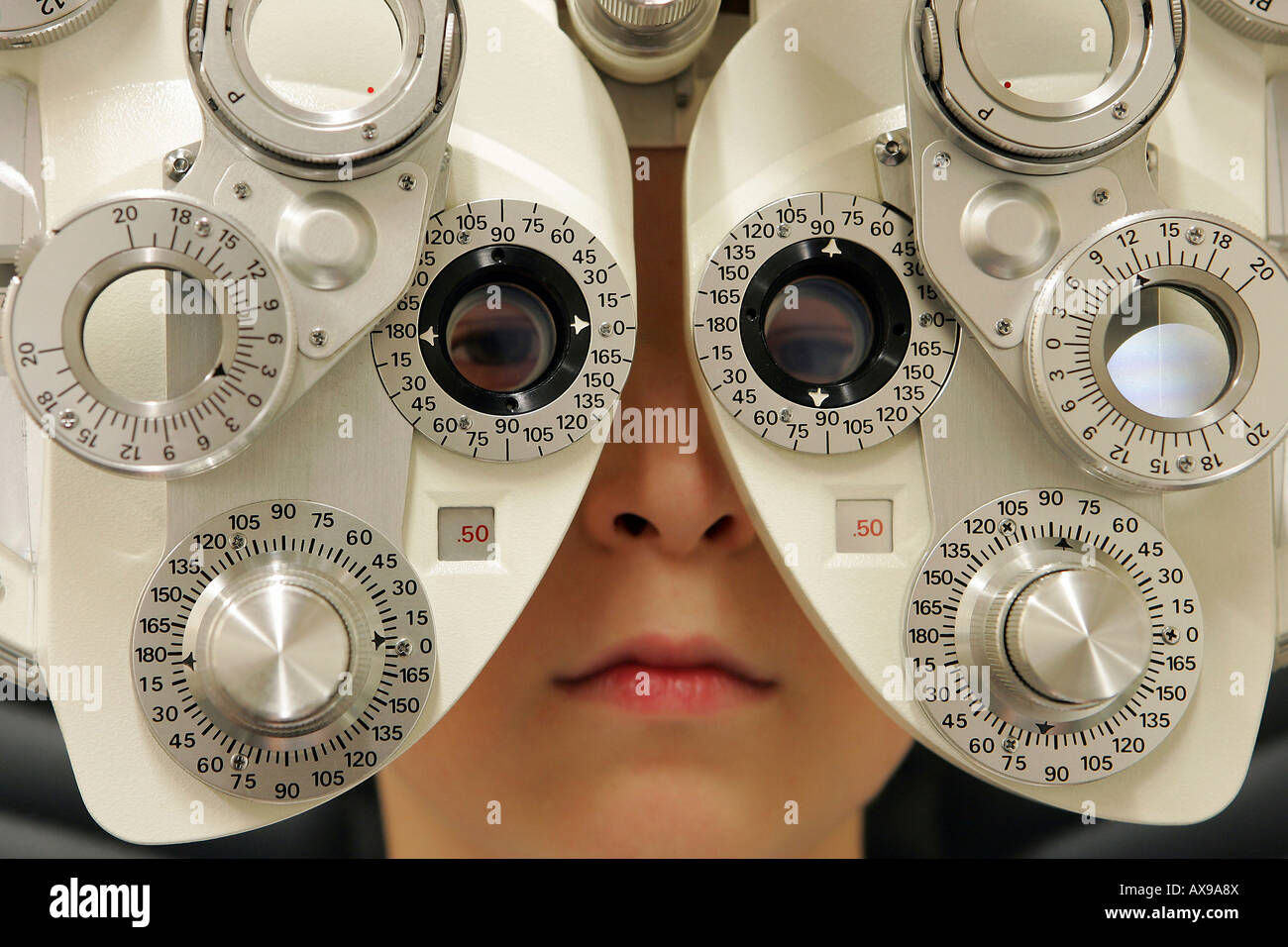 Eye examination using a phoropter Stock Photo - Alamy