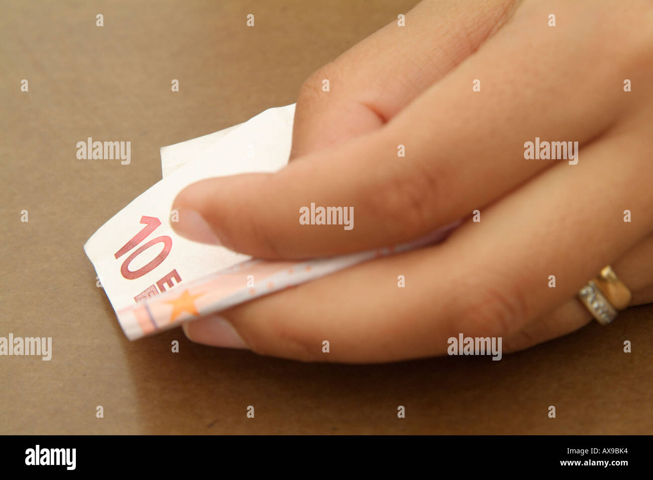 £10 note hand hi-res stock photography and images - Alamy