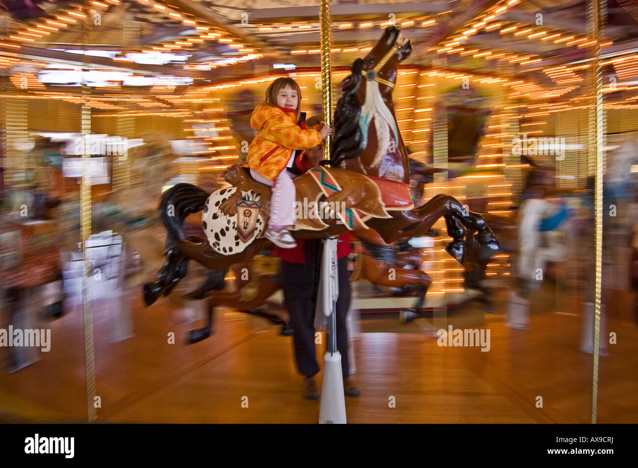Young girl on horse at Salems Riverfront Carousel Salem Oregon Stock ...