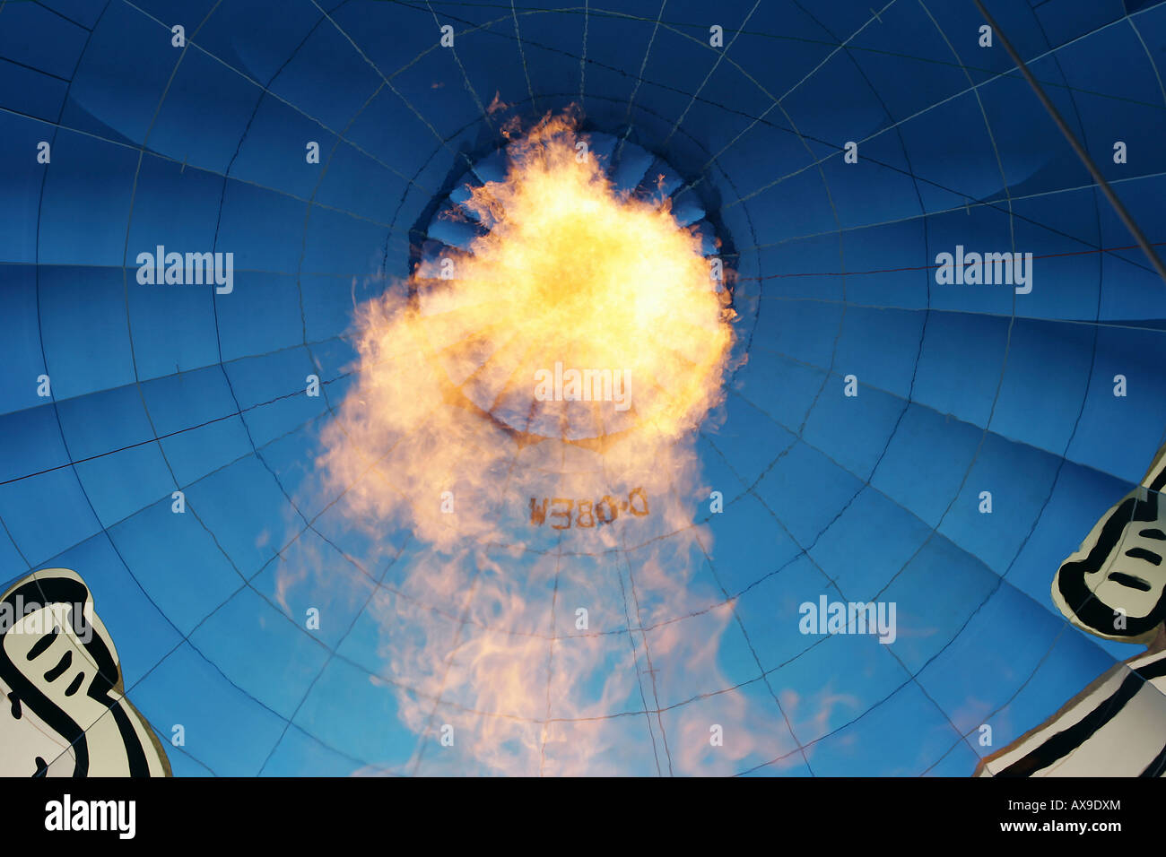Flame heating up the air inside a hot air balloon Stock Photo - Alamy