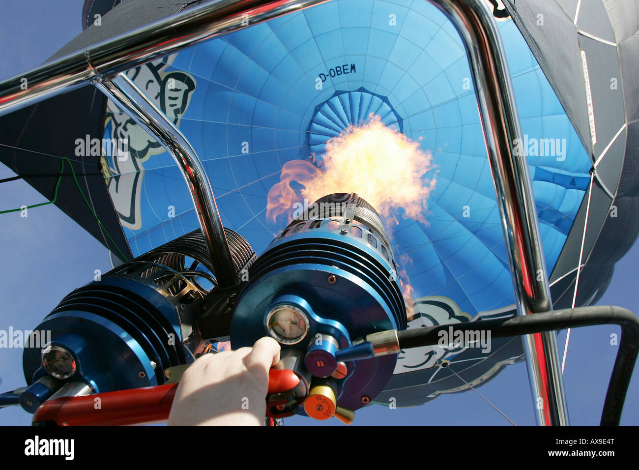 Flame heating up the air inside a hot air balloon Stock Photo - Alamy