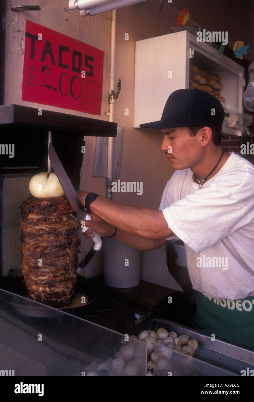 1, one, Mexican man, young adult man, working at taco stand, taco stand ...