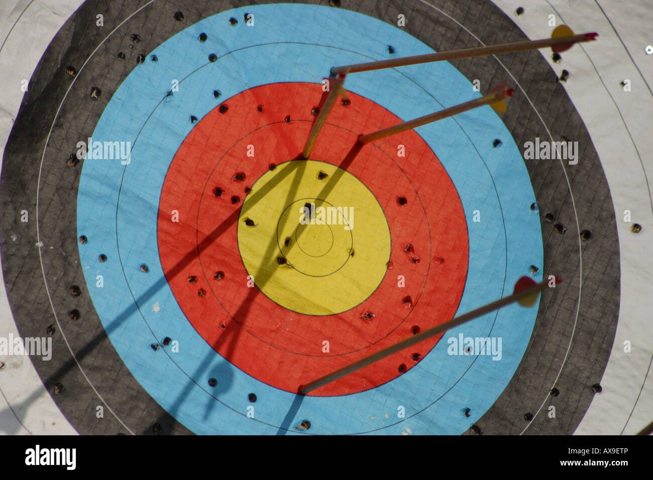 arrows archery target outer bull yellow red blue Stock Photo - Alamy