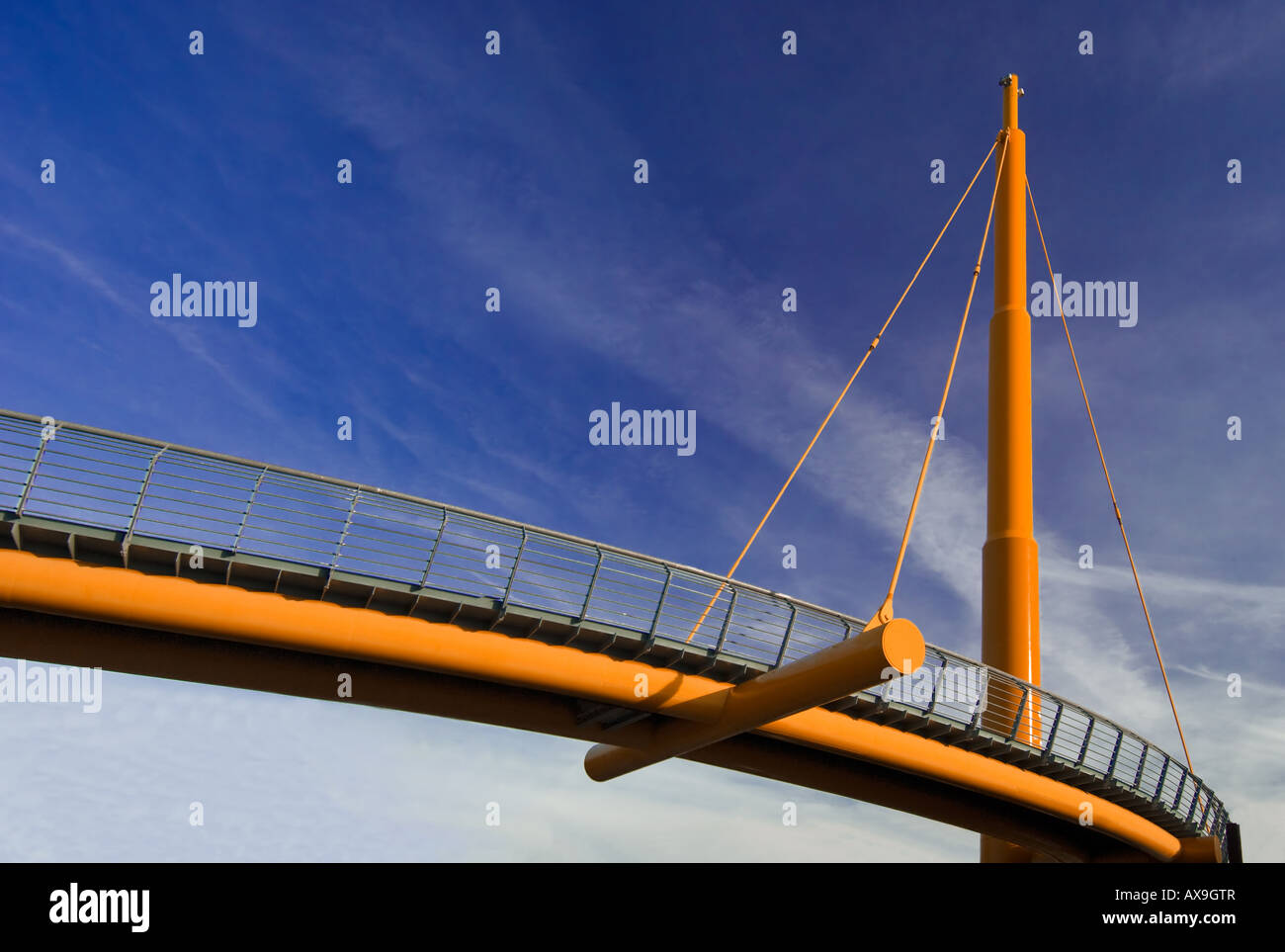 Orange pedstrian bridge near city of Willich, Northrine-Westfalia ...