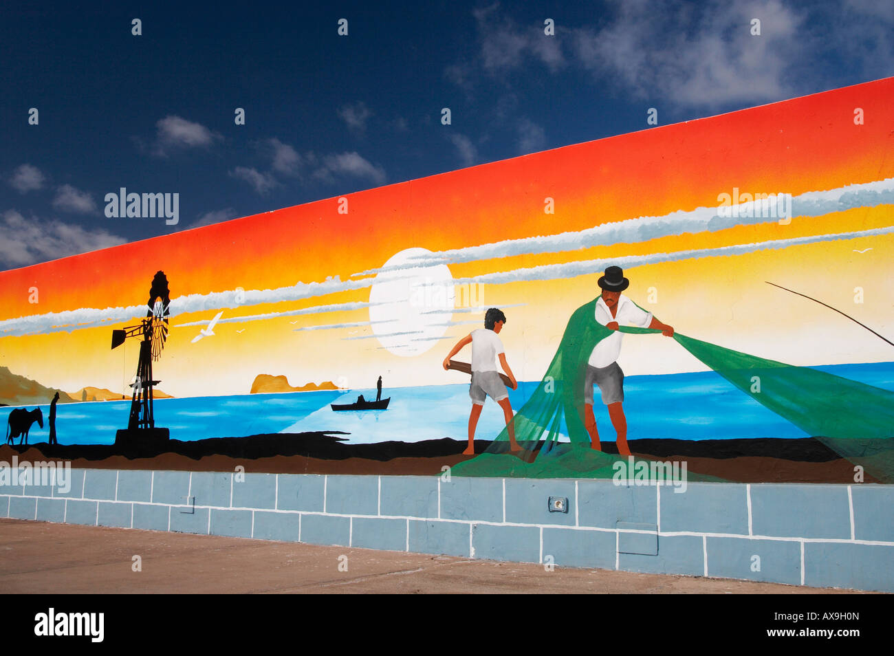 Mural depicting fishing scene painted on wall in village on Lanzarote ...