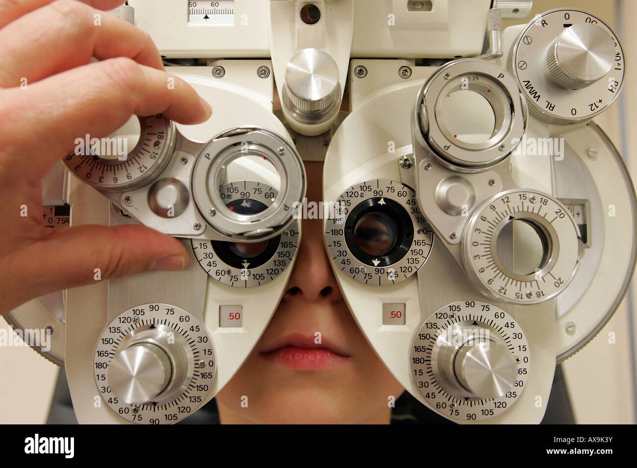 Eye examination using a phoropter Stock Photo - Alamy