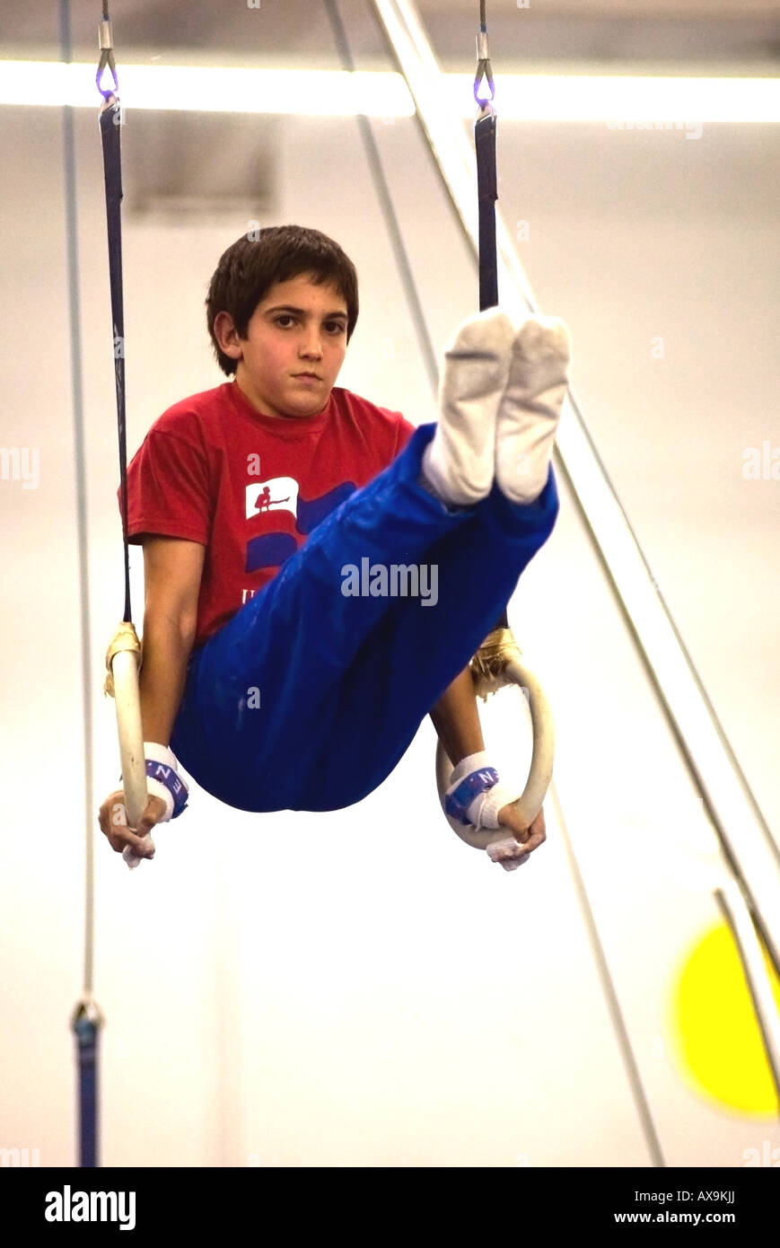 Teen boy gymnastics rings hi-res stock photography and images - Alamy