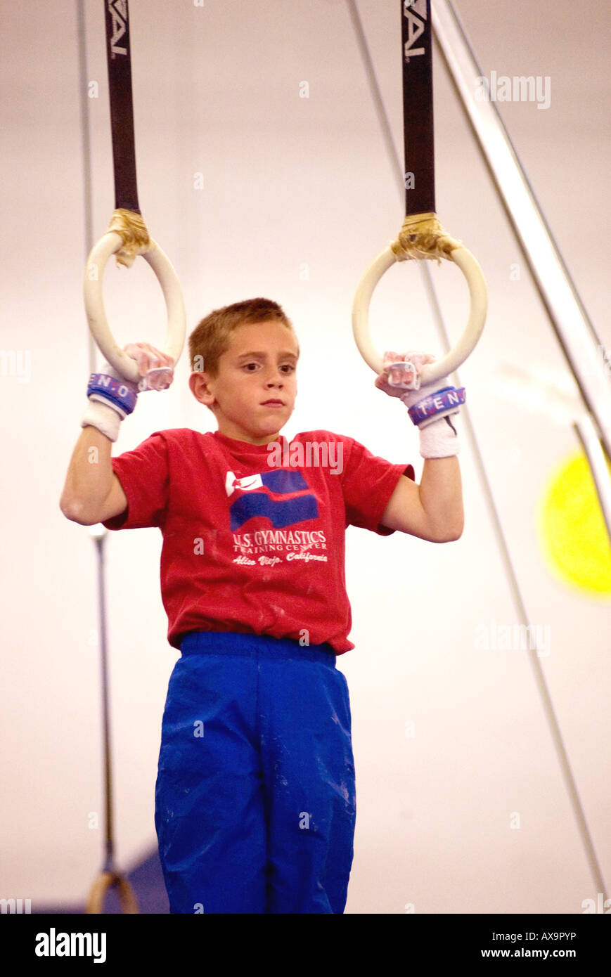 Teen boy gymnastics rings hi-res stock photography and images - Alamy