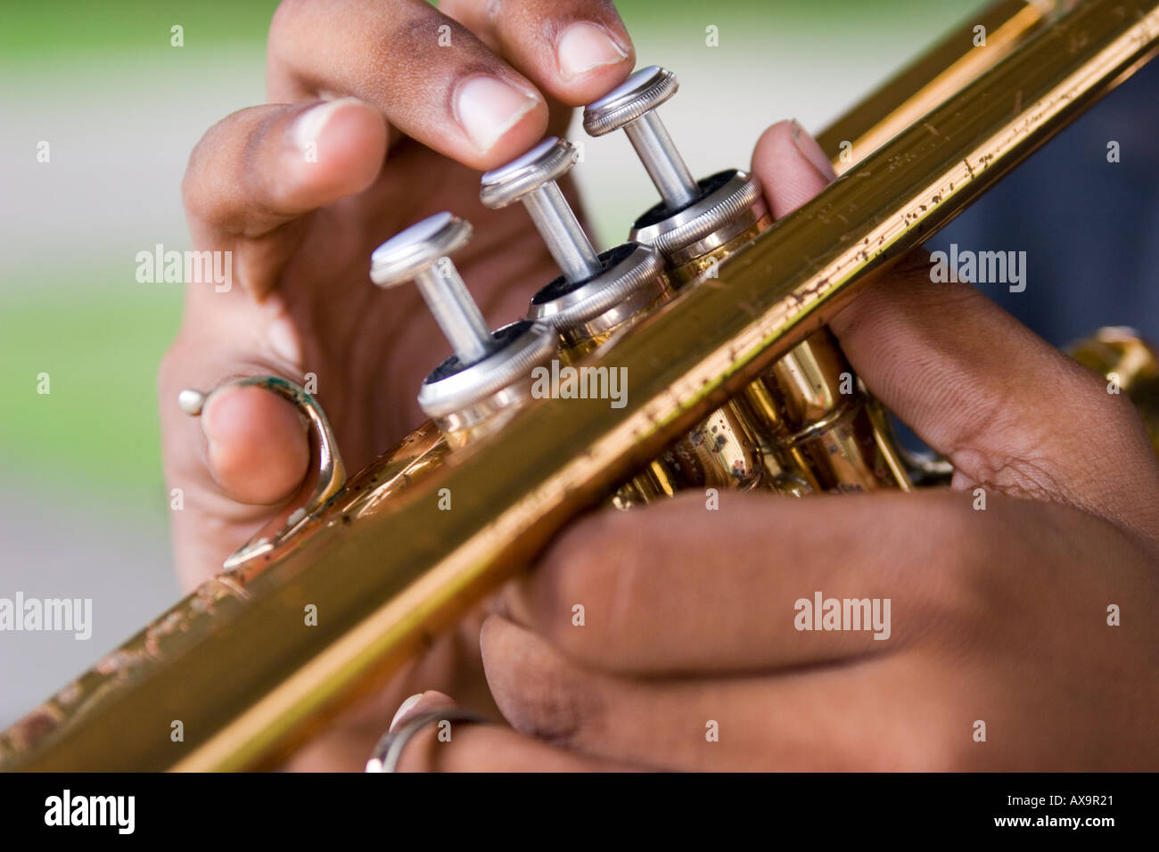 Close up of trumpet player hands Stock Photo - Alamy