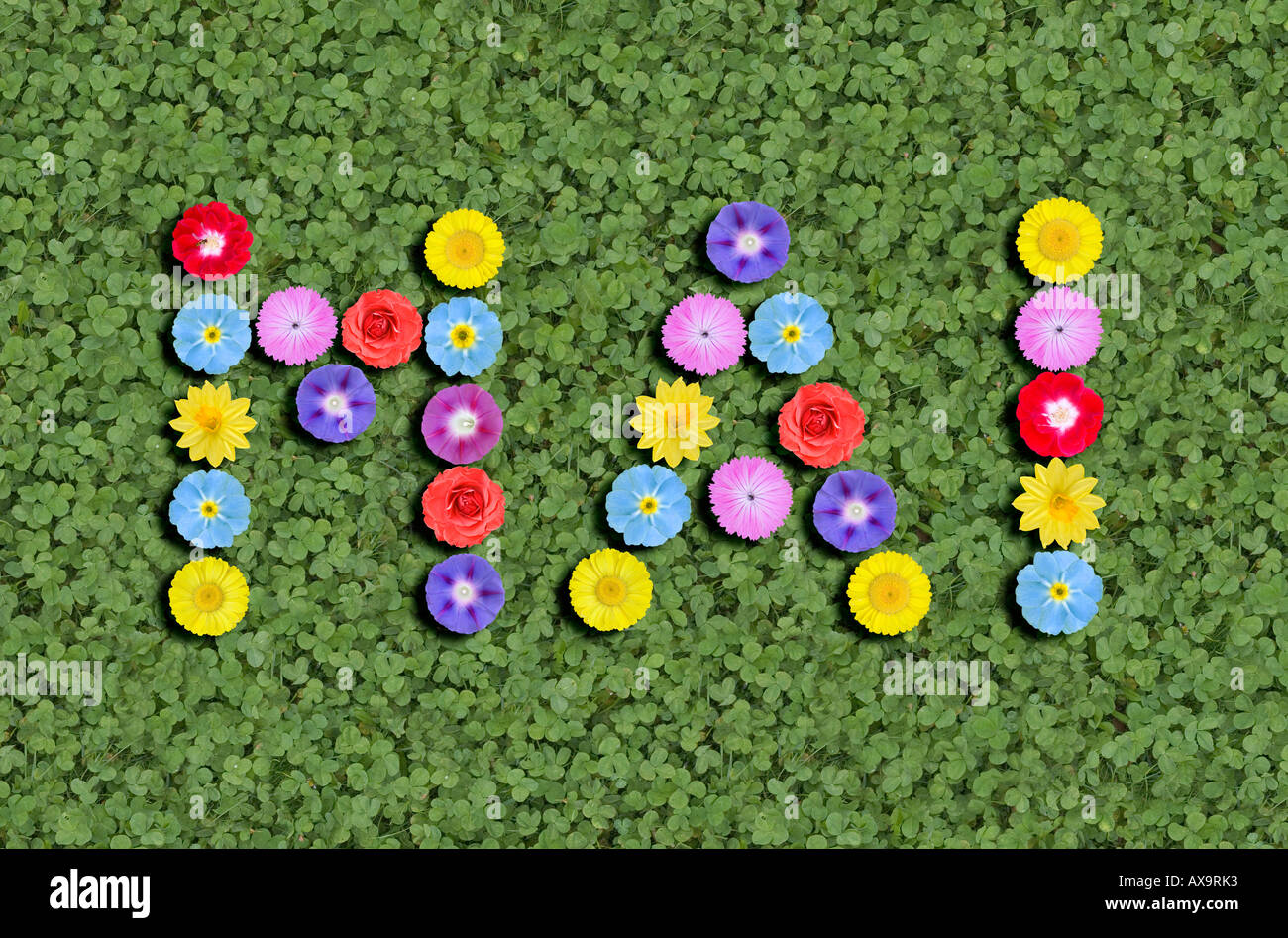 month may Mai written with flower heads Stock Photo - Alamy