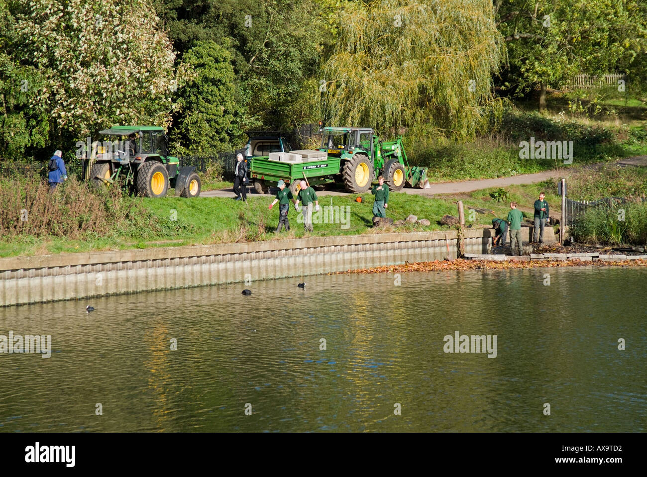 Men working on Highgate Ponds, Hampstead Heath National Park Stock ...