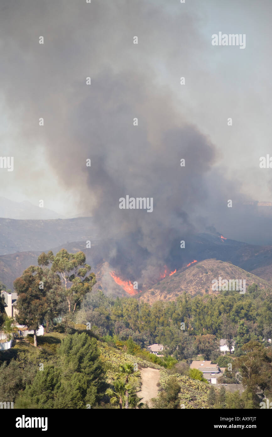 Brush fire in hills of Orange, California threaten homes Stock Photo ...