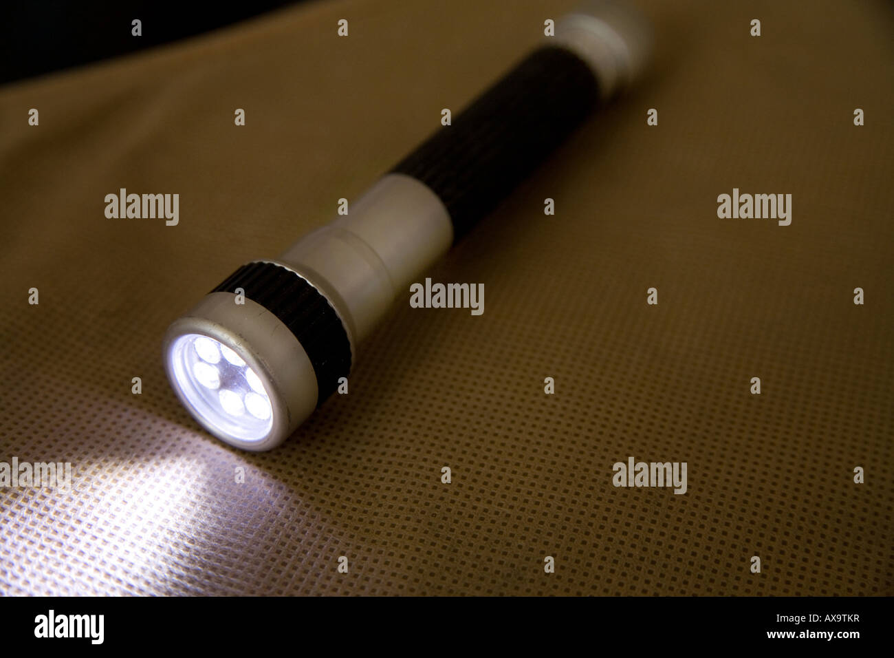 Flashlight with very bright LED bulbs uses so little power batteries ...