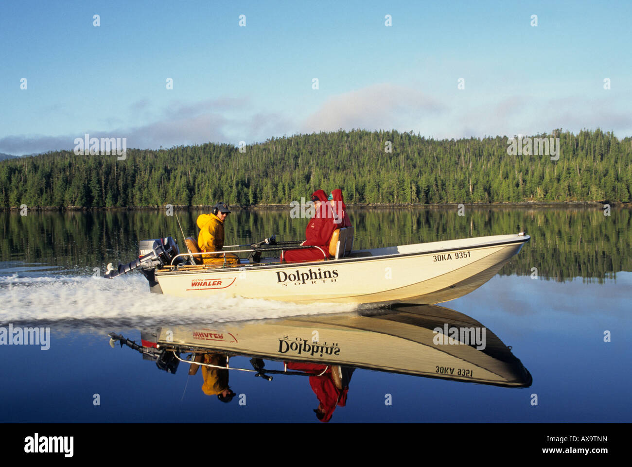 Boat speeding up inlet Work Channel BC Stock Photo - Alamy