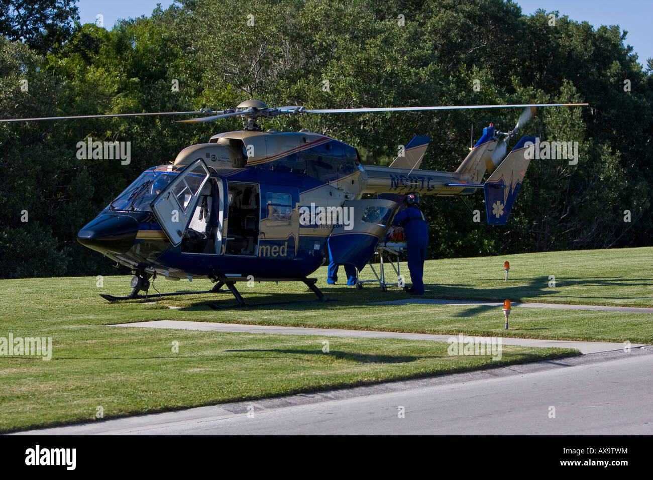Paramedics Loading Patient in MedEvac Helicopter Stock Photo - Alamy