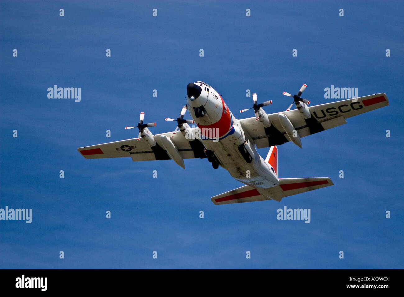 View from Below of United States Coast Guard C-130 Airplane Stock Photo ...