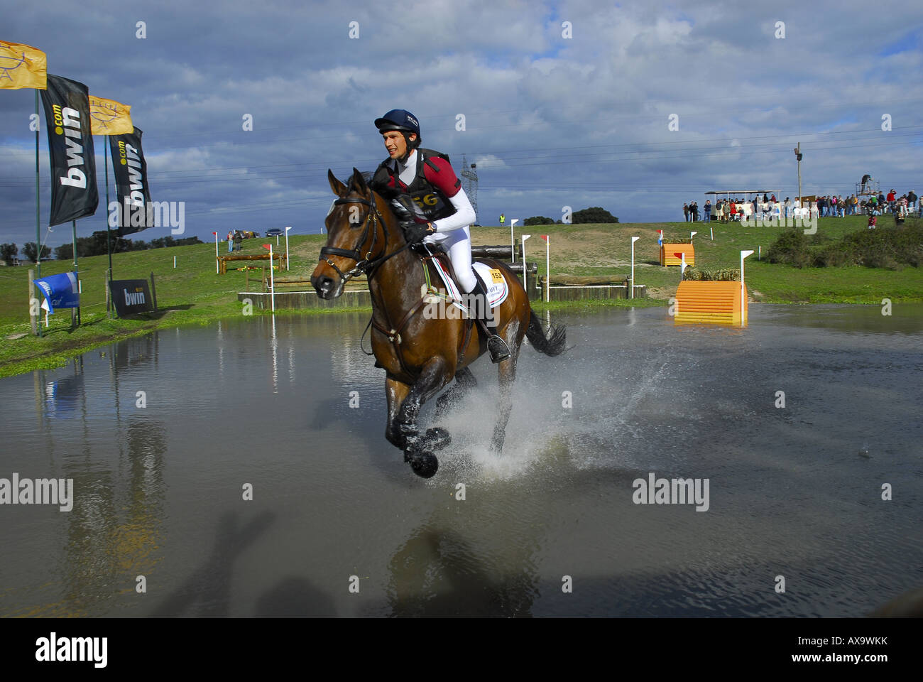 Action jockey water jump splash three day eventing three hi-res stock ...
