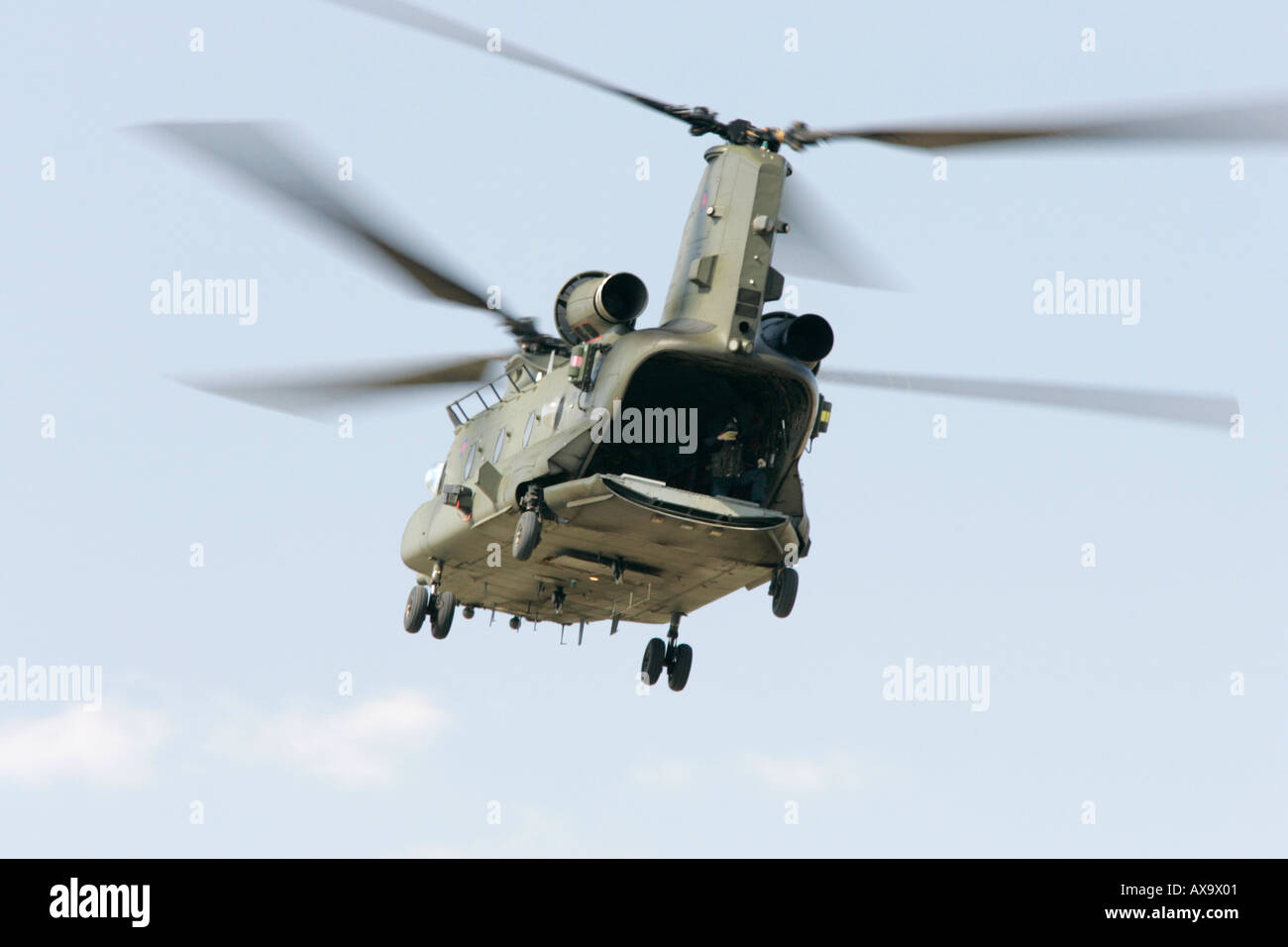 RAF Chinook HC5 CH 47 Boeing helicopter with crewman waving at RIAT ...