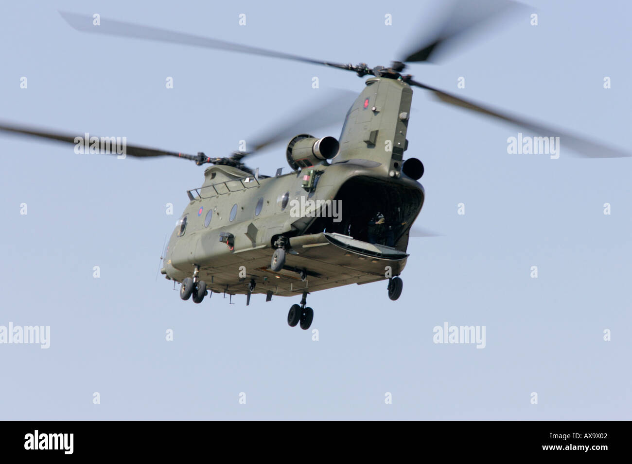 RAF Chinook HC5 CH 47 Boeing helicopter with crewman waving at RIAT ...