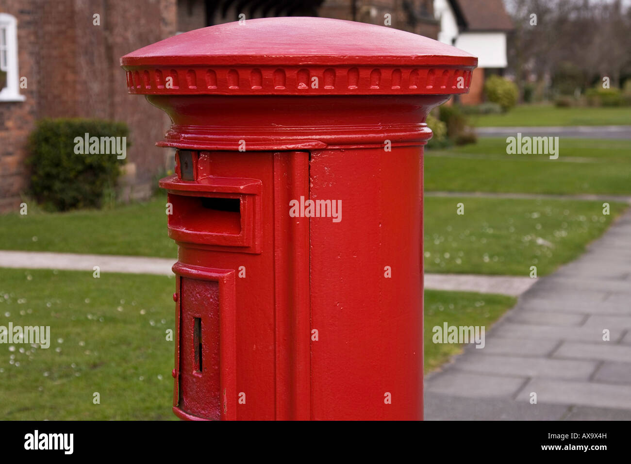 Posting a letter in a pillarbox hi-res stock photography and images - Alamy
