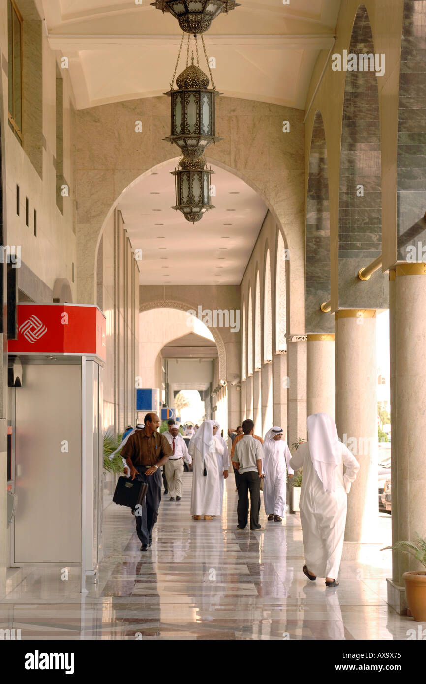 Qataris walking in central Doha, Qatar Stock Photo - Alamy