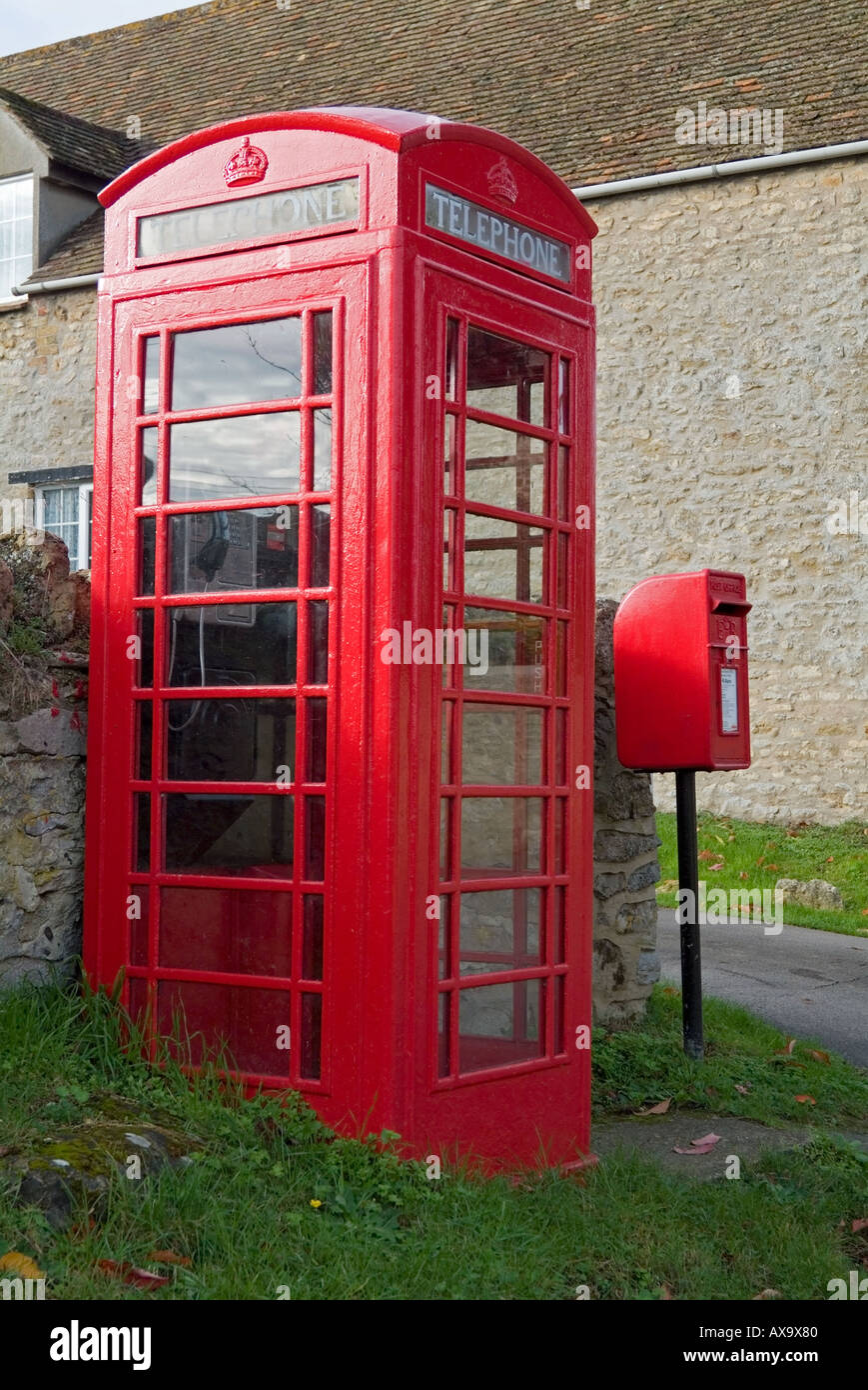 Old Style Red British Phone Booth and Mail Pillar Box Stock Photo - Alamy