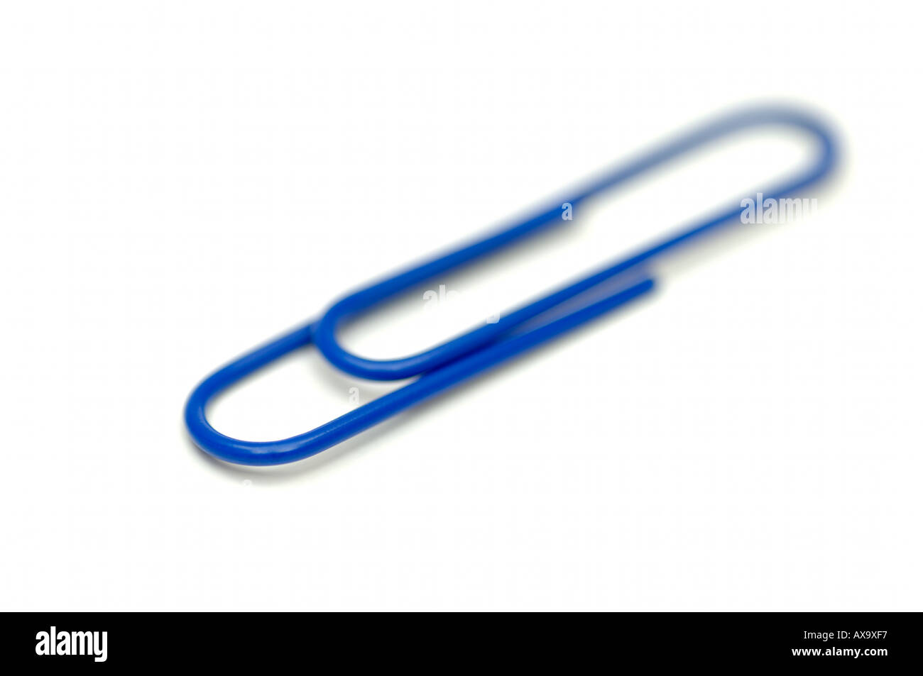 Blue Paper metal clip or pin on white background Stock Photo - Alamy