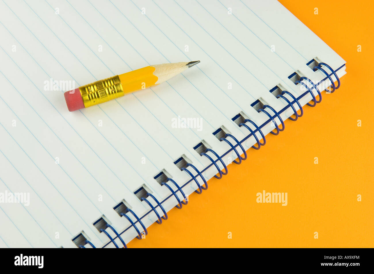 short pencil with notepad Stock Photo - Alamy