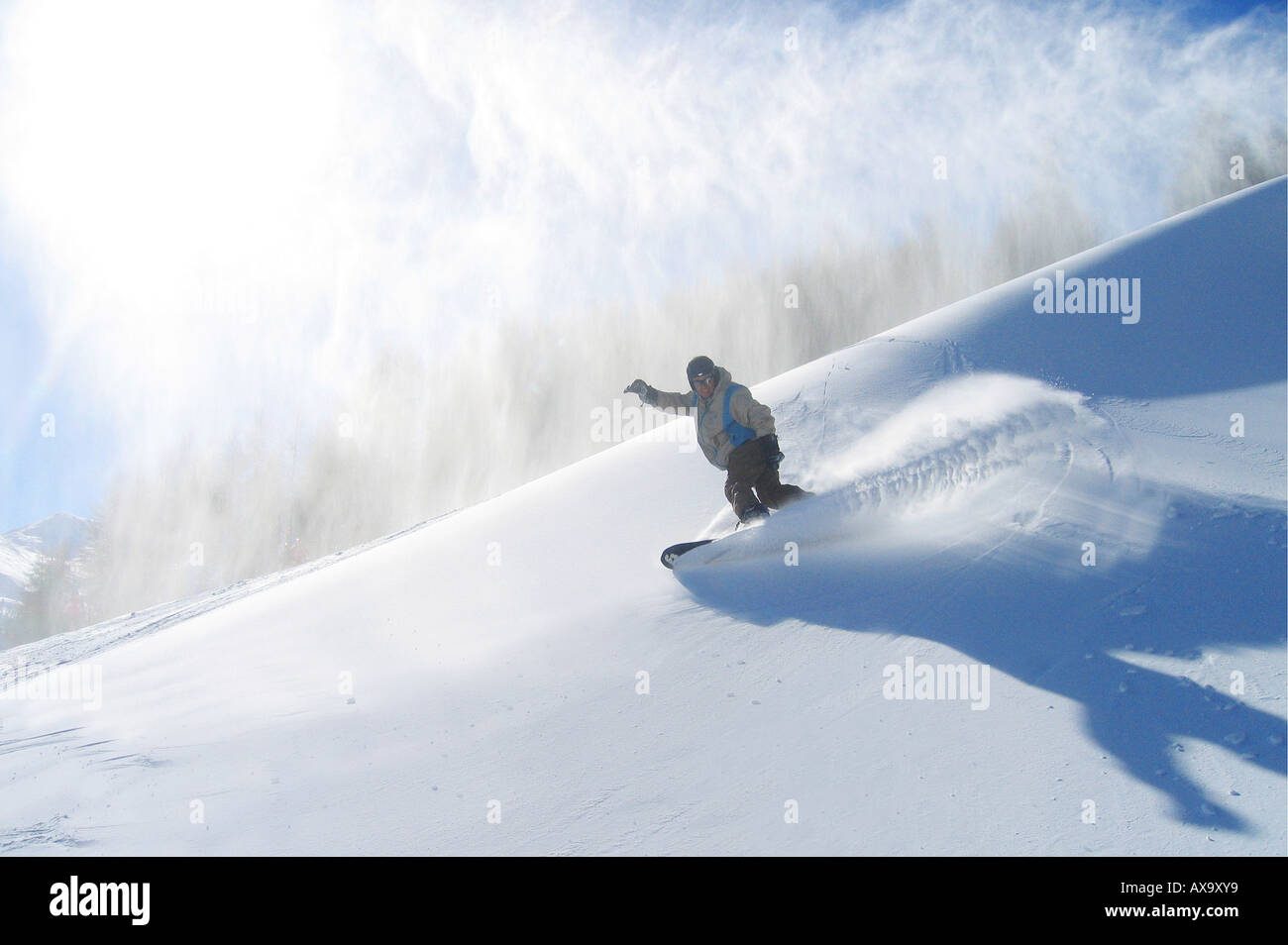 Back view young snowboarder hi-res stock photography and images - Alamy