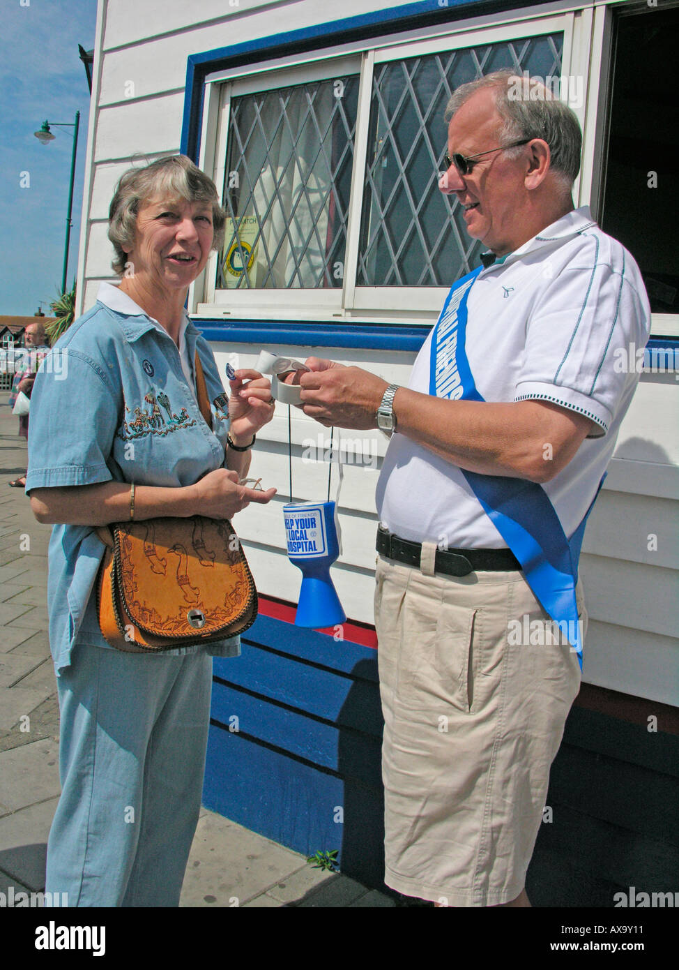 elderly man collecting money for charity on the street Shoreham by Sea ...