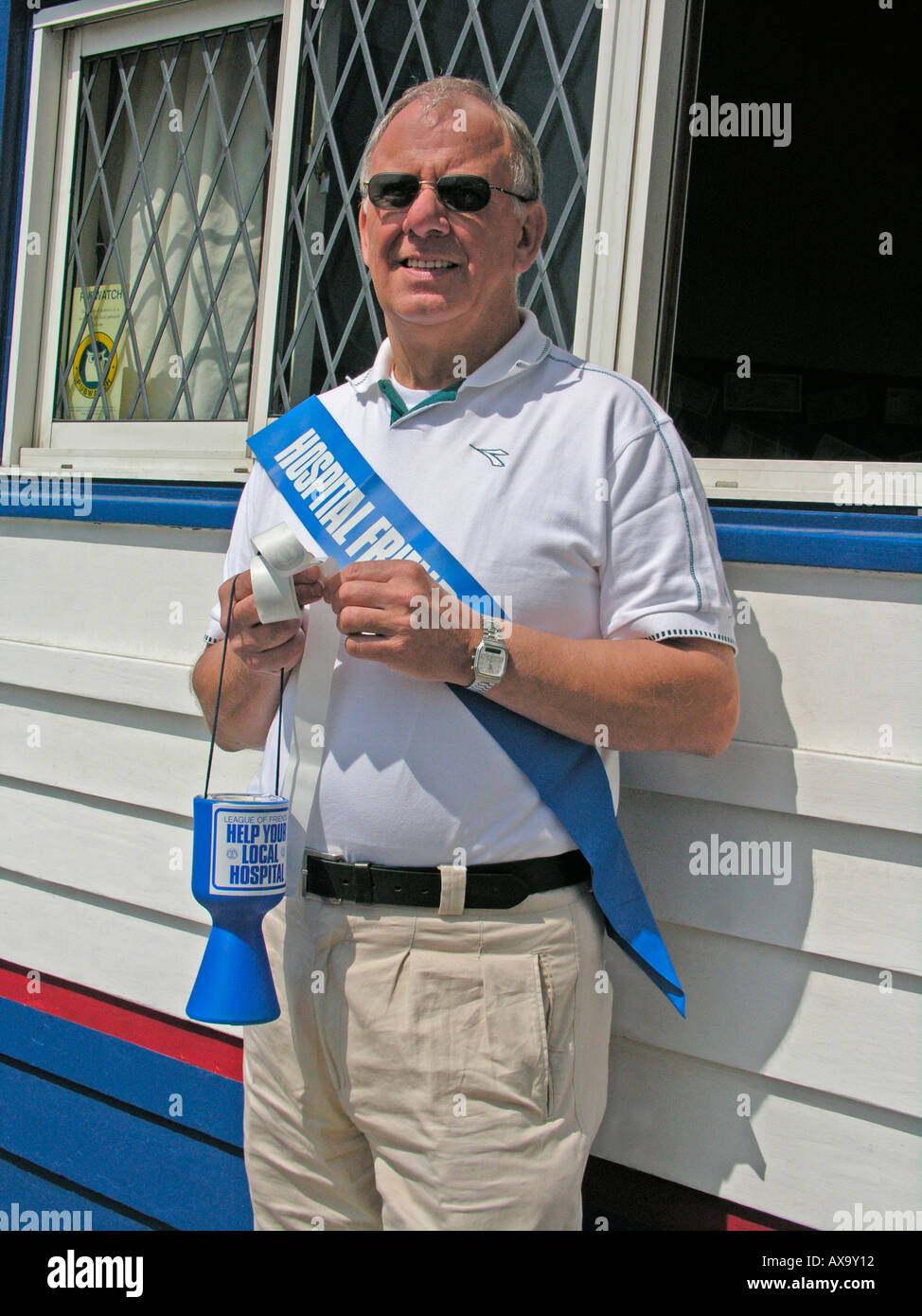 elderly man collecting money for charity on the street Shoreham by Sea ...