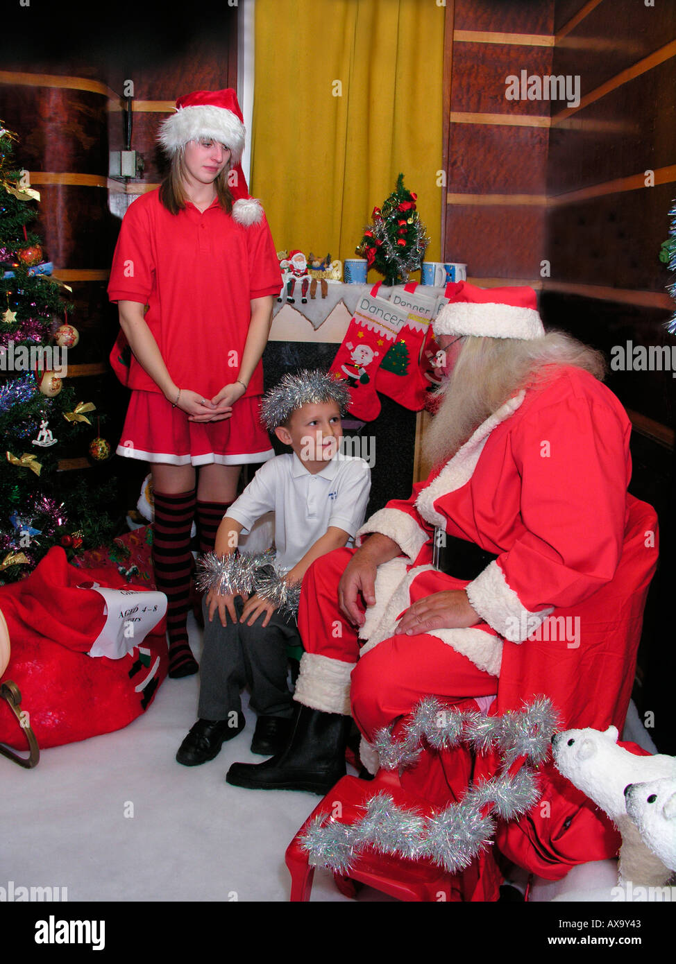 young boy visiting Santa s Grotto Stock Photo - Alamy