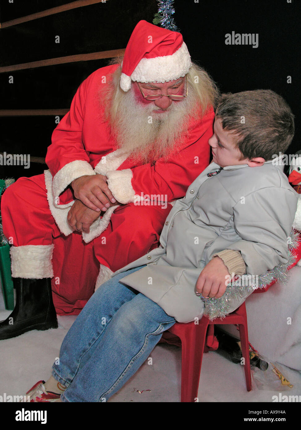 boy visiting Santa s Grotto Stock Photo - Alamy