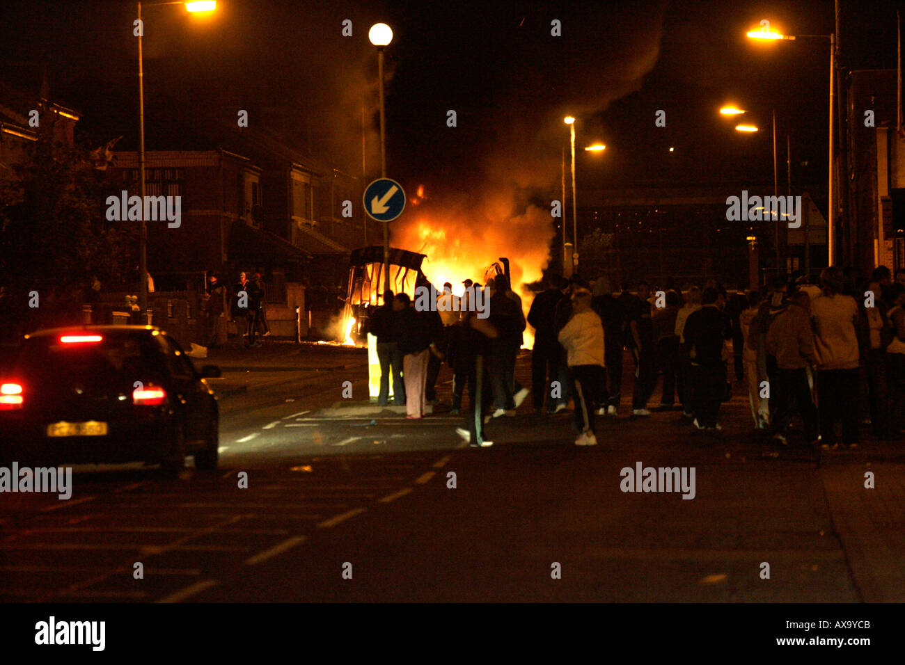 Loyalist protesters block road in North Belfast with burning vehicles ...