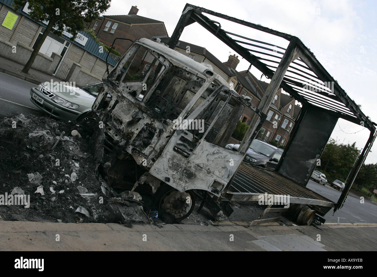 remains of burnt out lorry van after loyalist rioting and violence ...