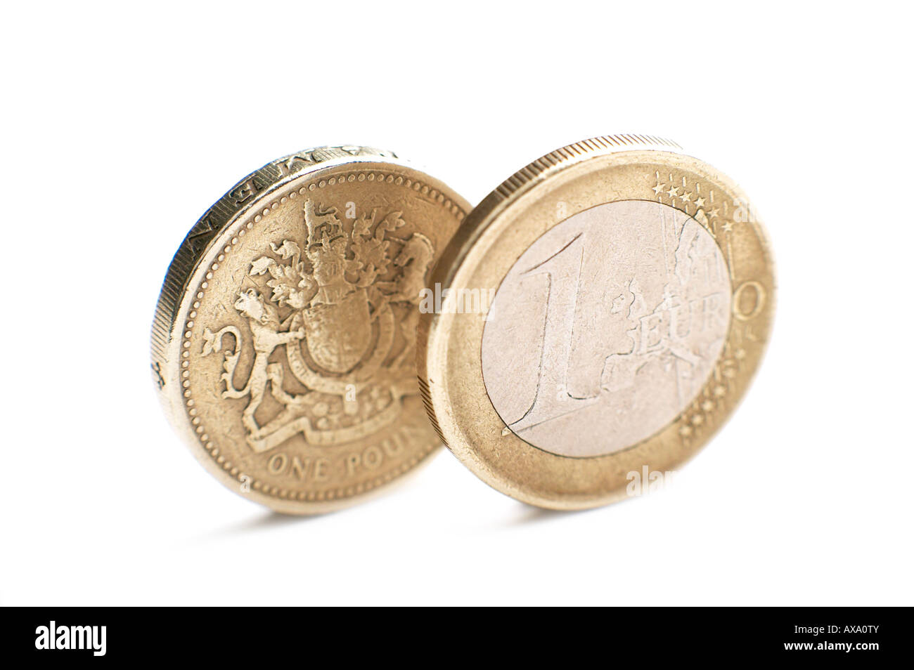 one euro and sterling pound coins on a white background with drop ...