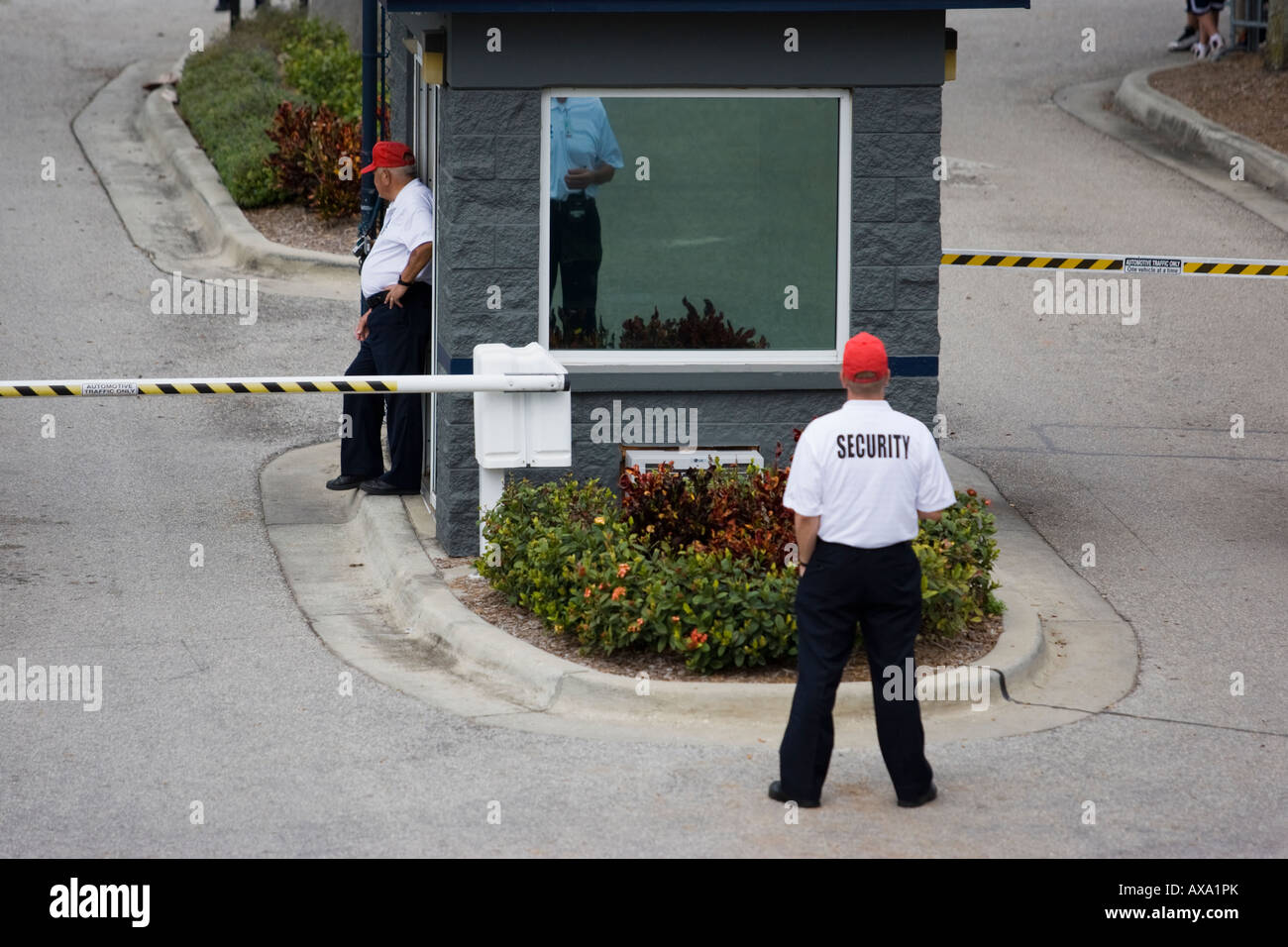 Security guards at an entrance Stock Photo - Alamy