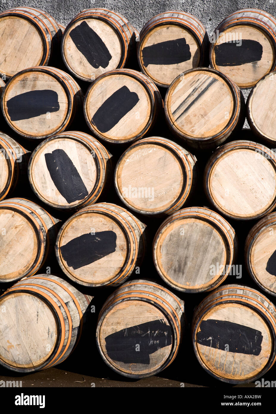 Oak whisky casks stacked in a distillery yard Scotland Stock Photo - Alamy