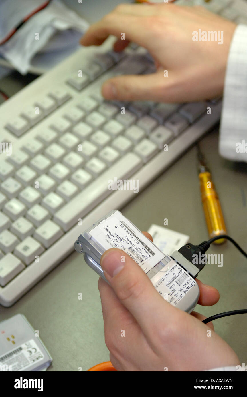 mobile phone repair and testing Stock Photo - Alamy