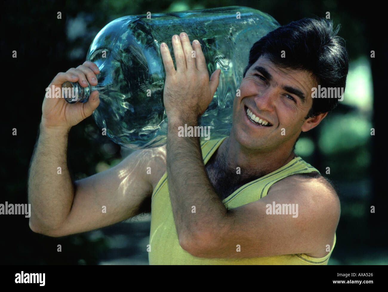 Man carrying water jug hi-res stock photography and images - Alamy