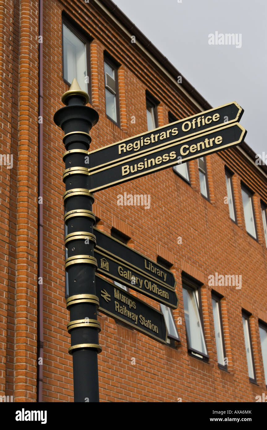 Direction post Oldham town centre Stock Photo - Alamy