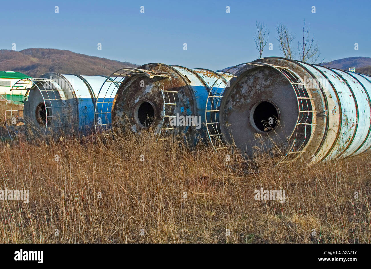 Old abandoned industry silos Stock Photo - Alamy