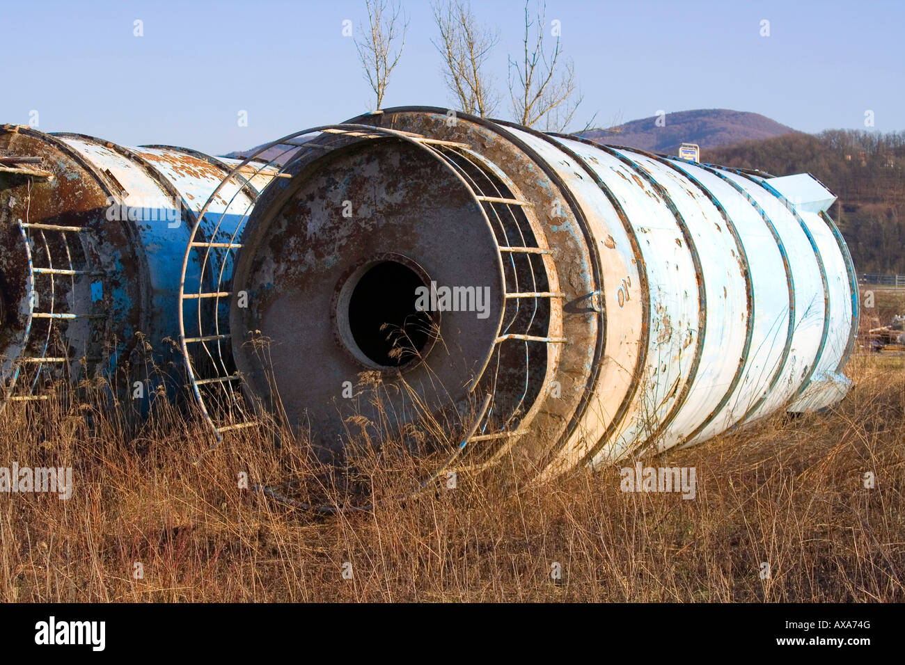 Old abandoned industry silos Stock Photo - Alamy