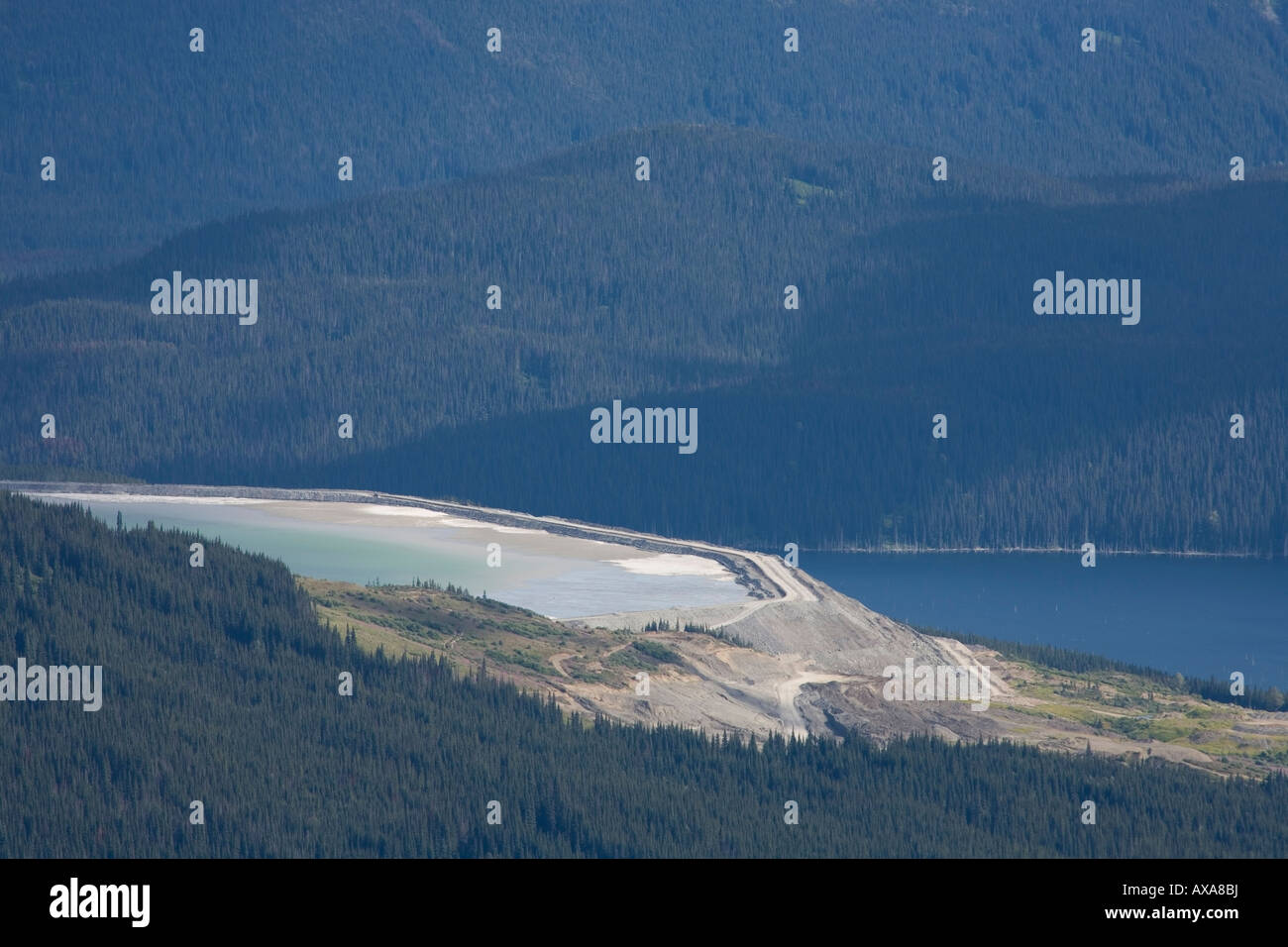 Tailings pond of Huckleberry open pit copper mine from Sweeney Mountain ...