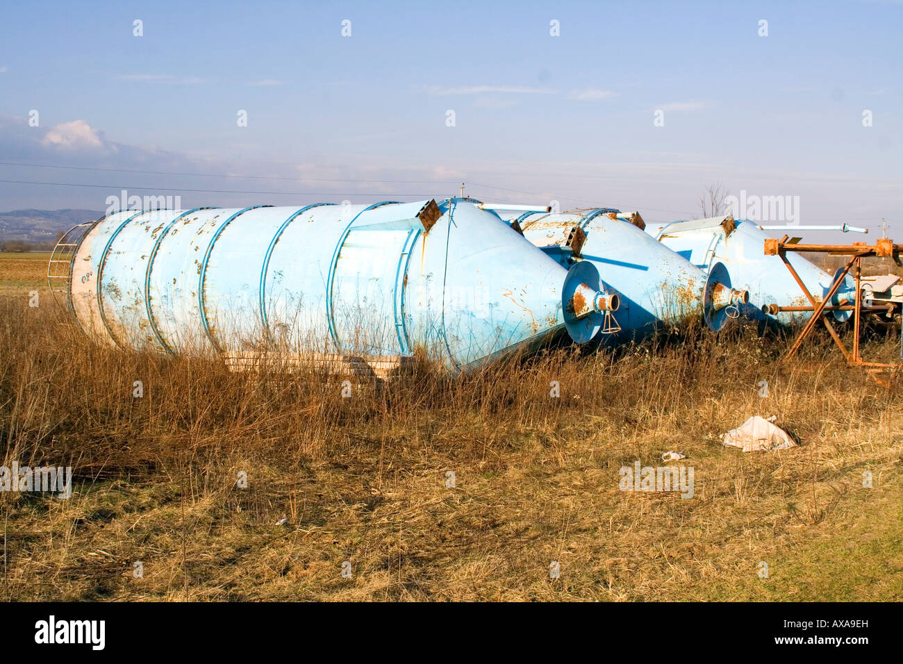 Old abandoned industry silos Stock Photo - Alamy