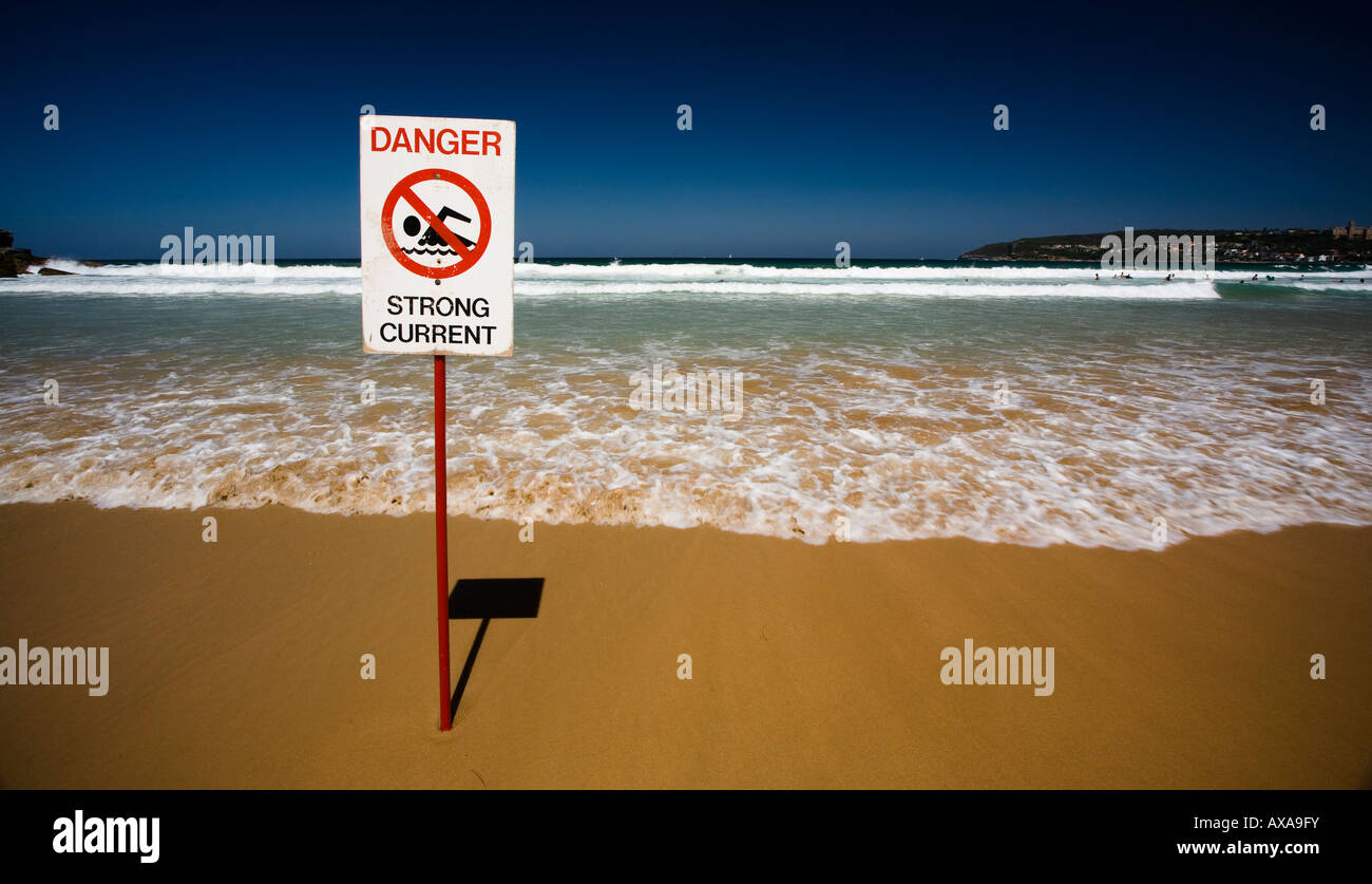 sea surge toward danger sign Stock Photo - Alamy