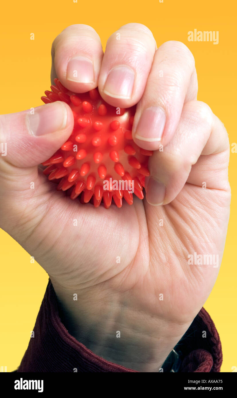 hand with a stress ball Stock Photo - Alamy